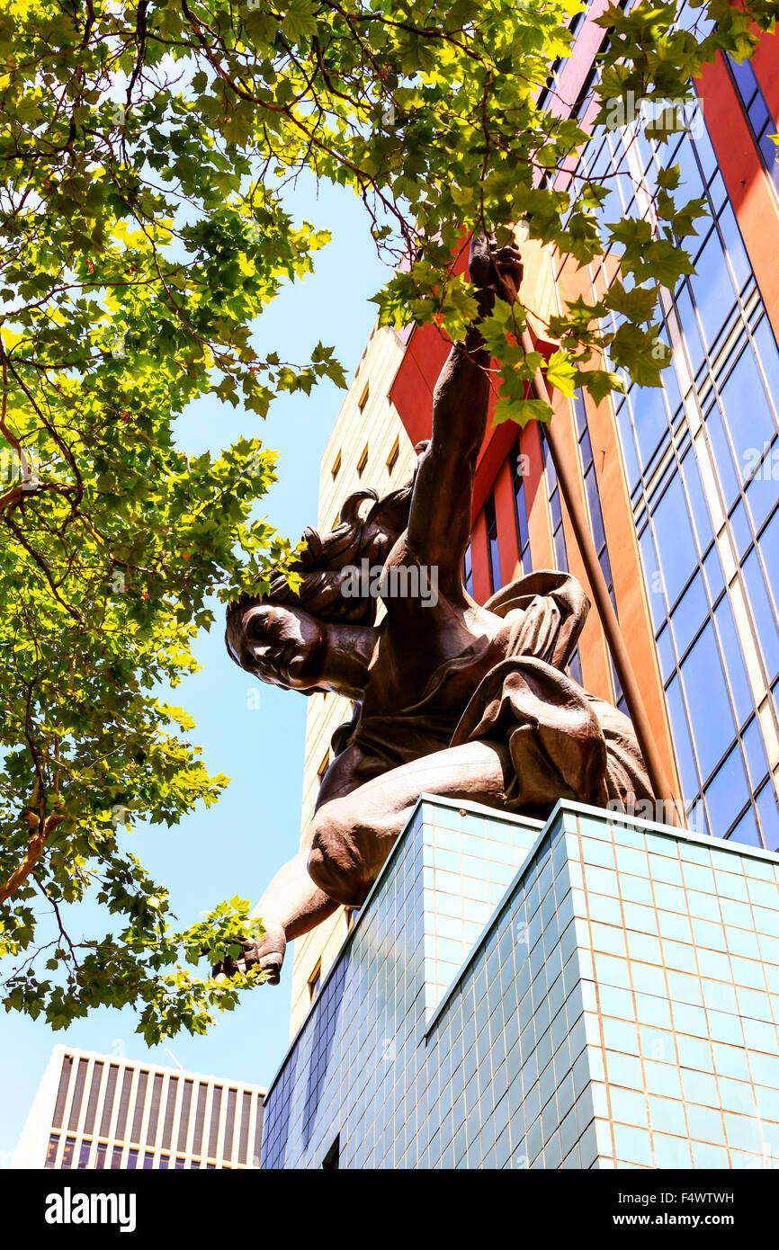 Bronze statue over the doorway of the Portland building on 5th Avenue ...