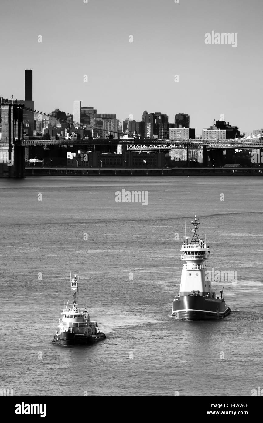 A Meredith C. Reinauer tugboat and a Franklin Reinauer tugboat sailing ...