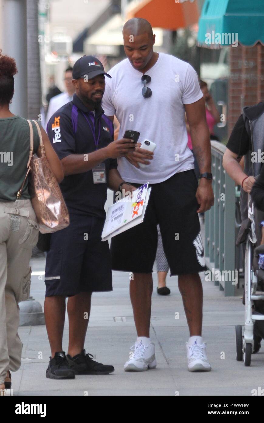 Former NBA star and FOX Sports analyst Corey Maggette poses for photos ...