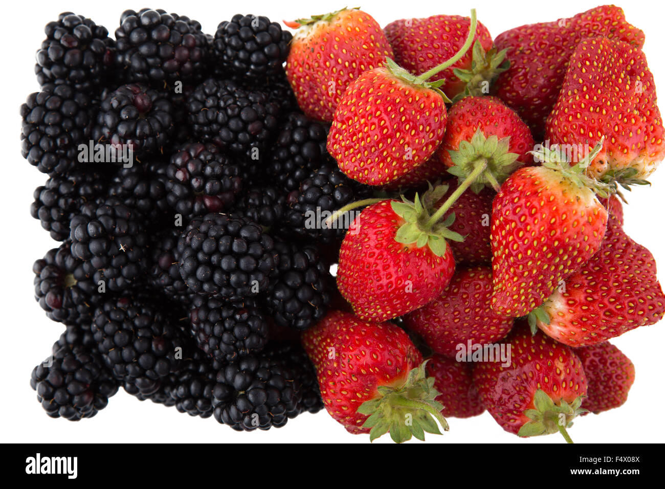 Blackberry and strawberry isolated on white background Stock Photo - Alamy