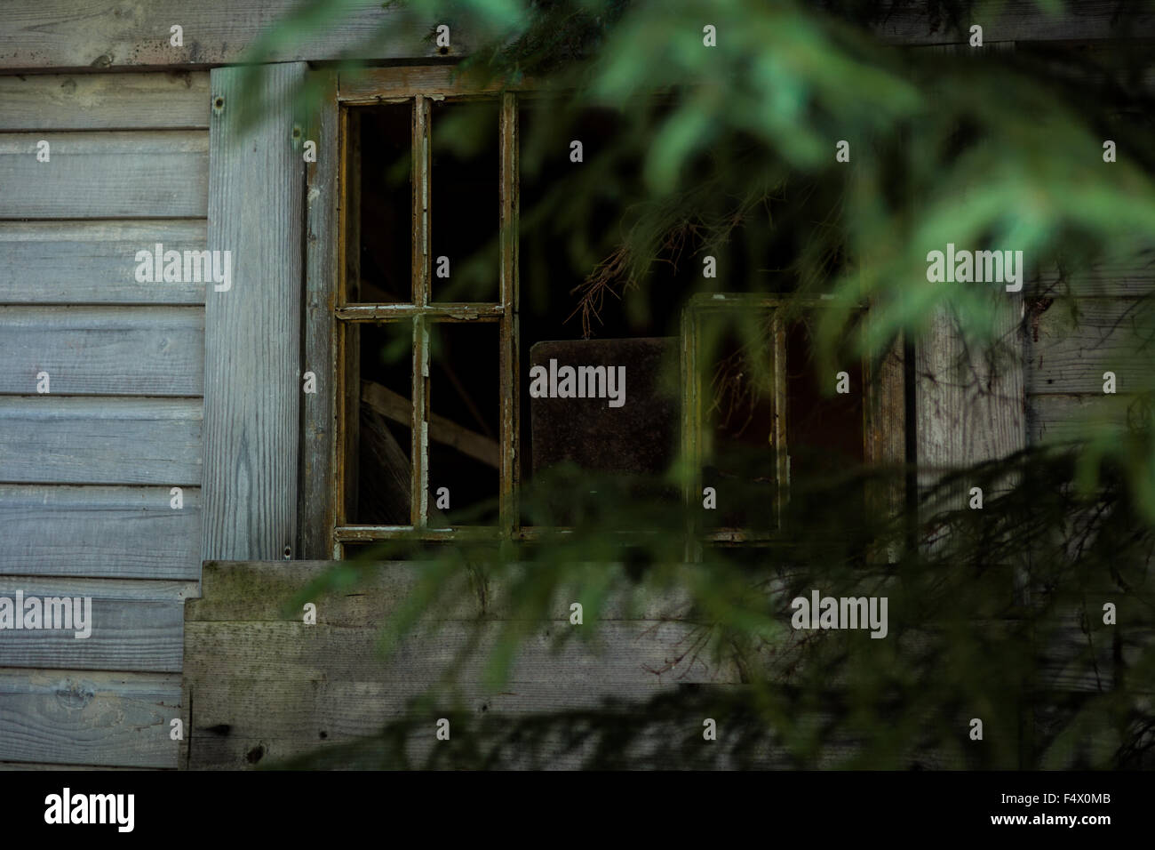 Creepy old cottage window hi-res stock photography and images - Alamy