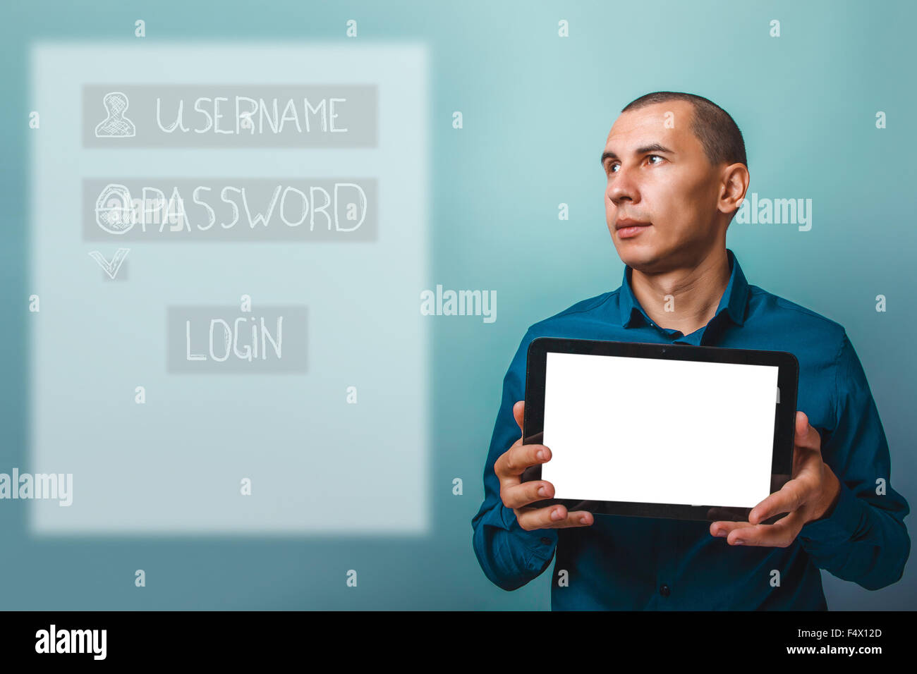 male man businessman holding a tablet login password on the web Stock ...