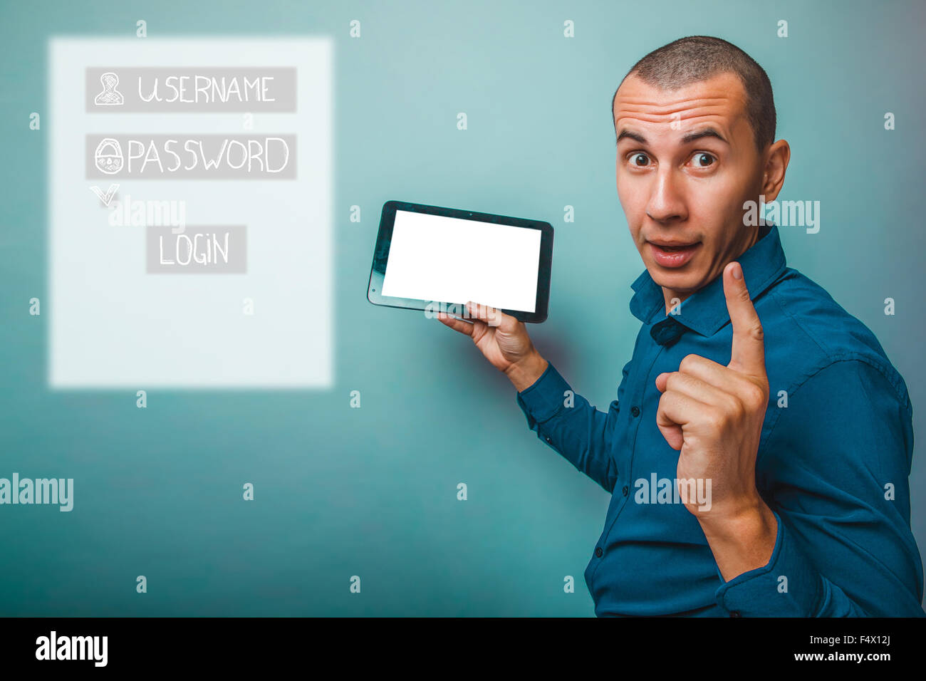 male man businessman holding tablet login password on the web si Stock ...