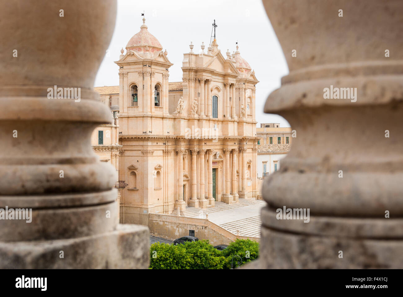 The baroque cathedral of Noto (UNESCO site in Sicily), seen through two ...