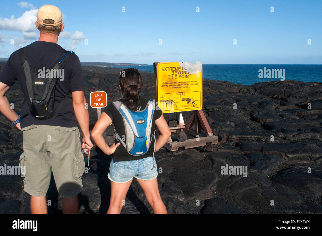 End of trail. Black lava mountains near the coast and highway Chain of ...