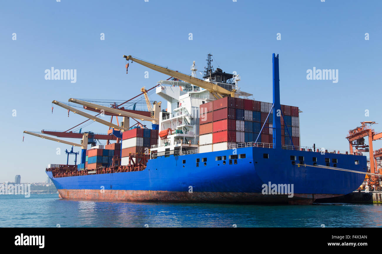 Container Ship is loading in a port Stock Photo - Alamy