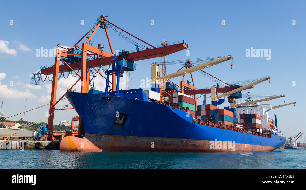 Container Ship is loading in a port Stock Photo - Alamy