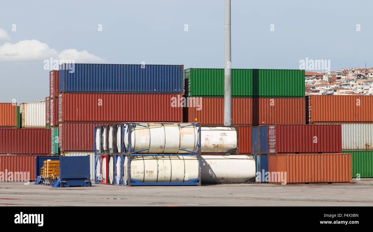 Containers waiting to transfer in a port Stock Photo - Alamy