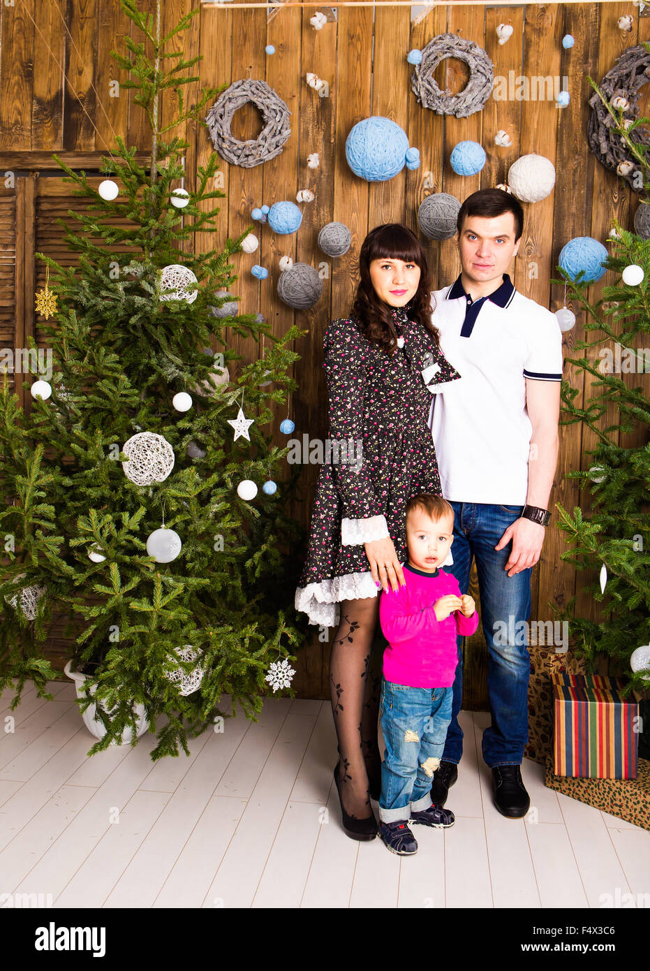 Christmas Family Portrait In Home, Xmas Tree Stock Photo - Alamy