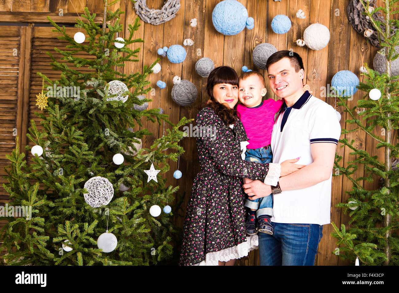 Christmas Family Portrait In Home, Xmas Tree Stock Photo - Alamy