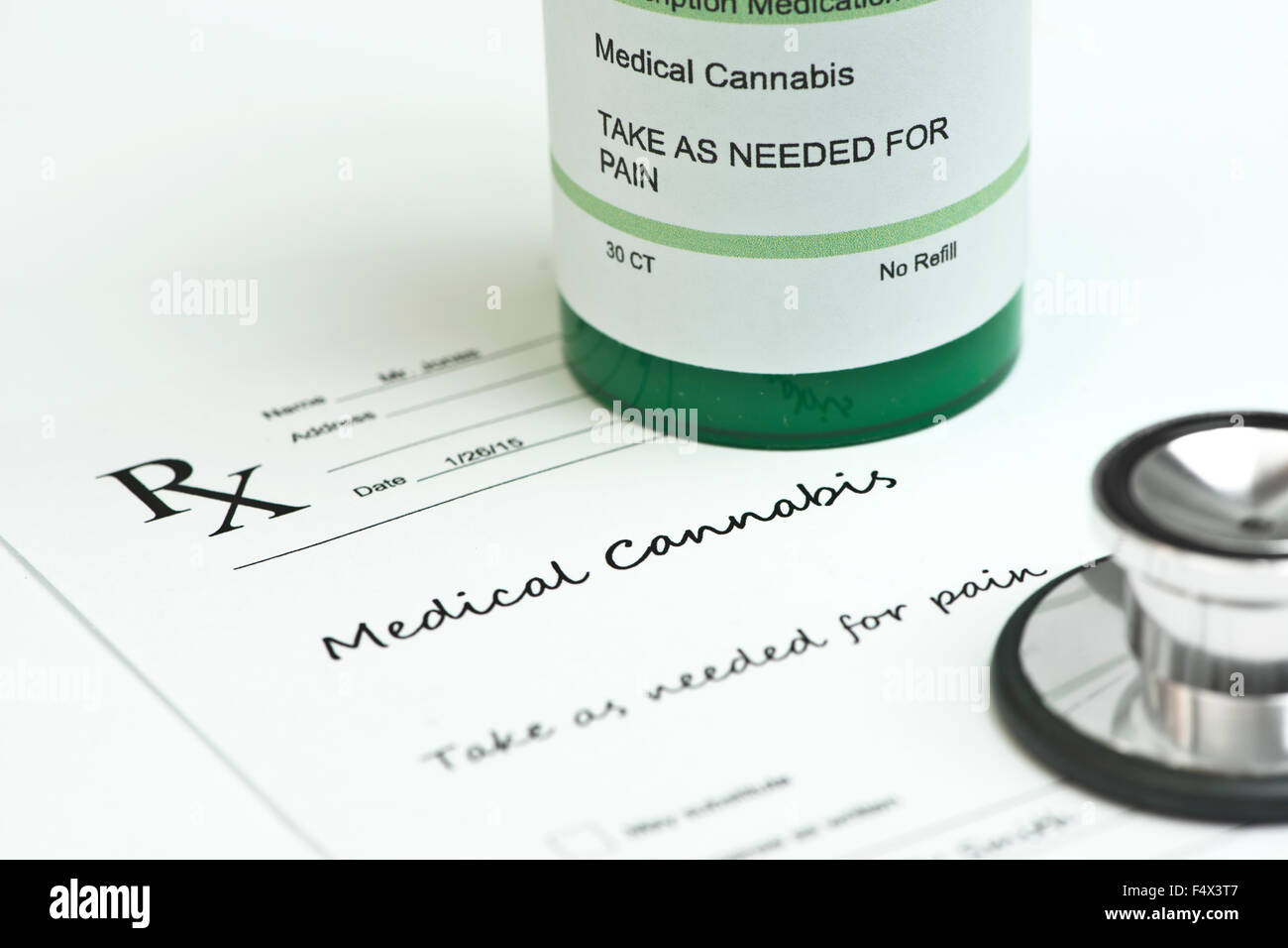 Medical marijuana prescription with bottle and stethoscope. Document ...