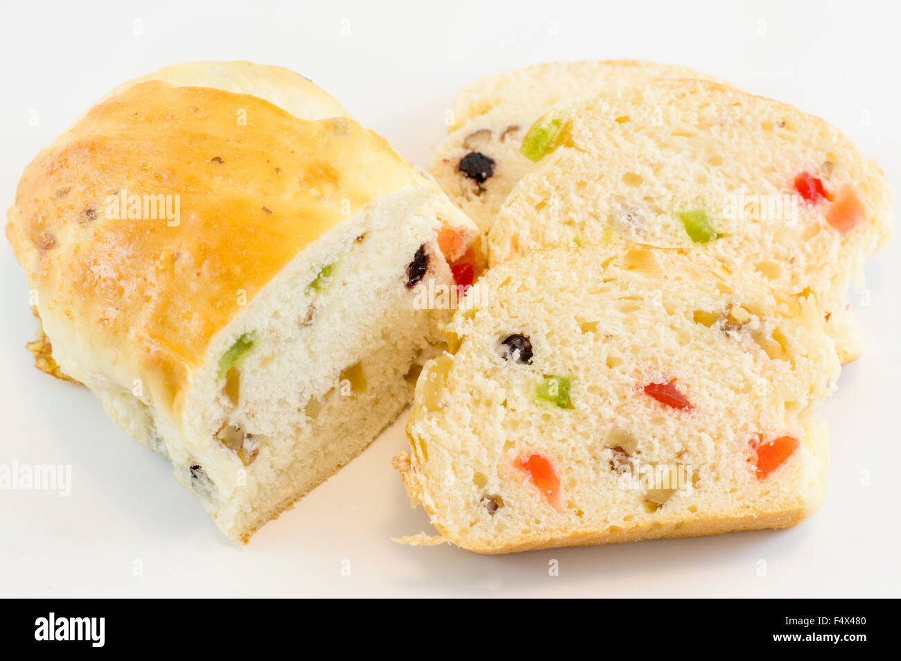 Homebaked colorful fruit bread with various dry fruits on white ...