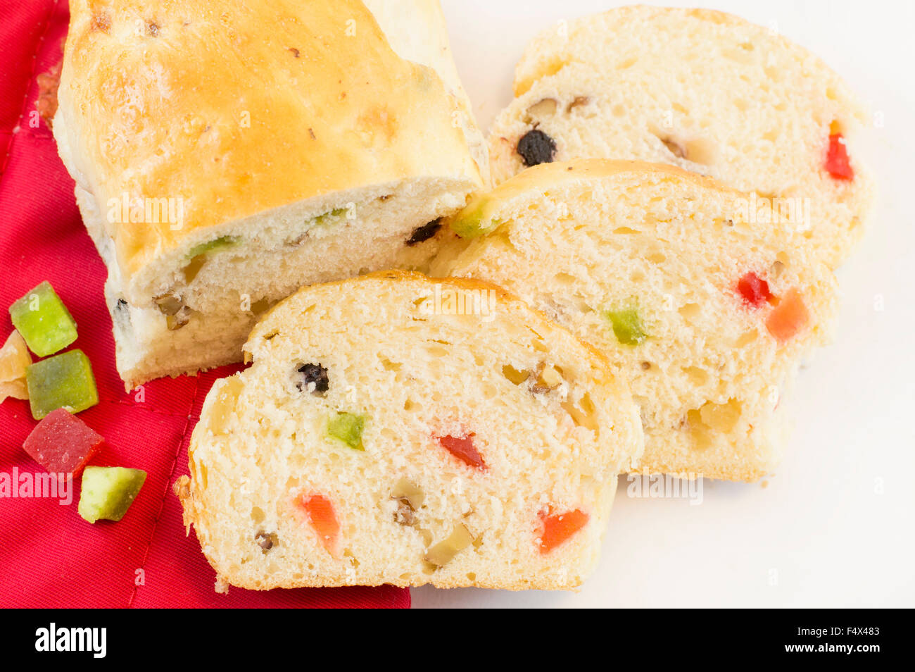 Homebaked colorful fruit bread with various dry fruits on white ...