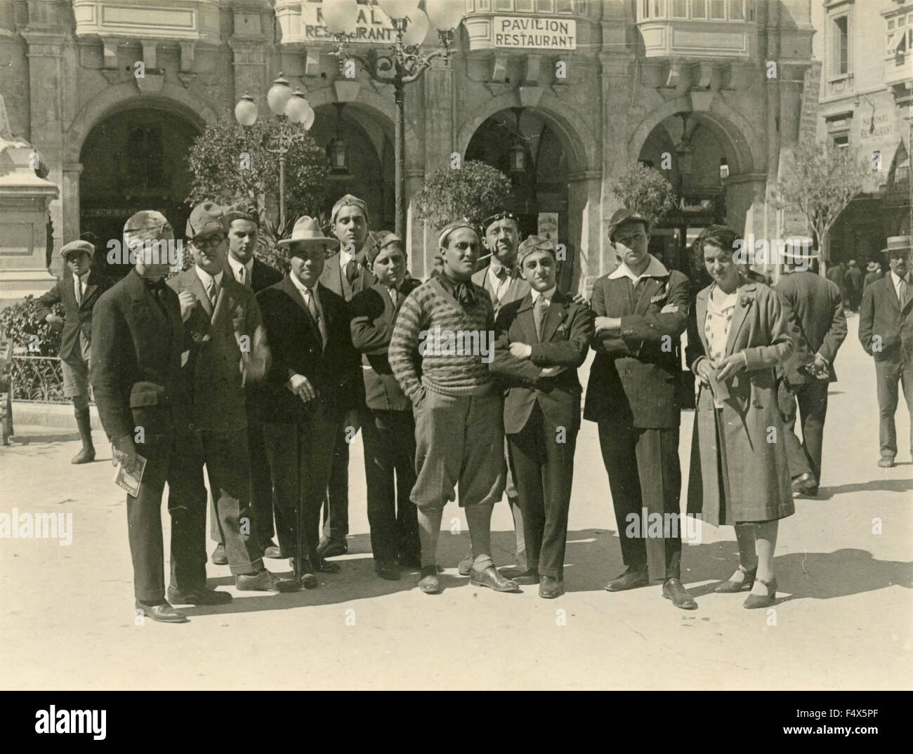 A group of people with strange hats in Republic Square, Valletta, Malta ...