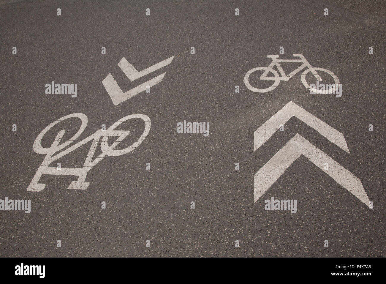 Bike Lane Sign on Pavement Stock Photo - Alamy
