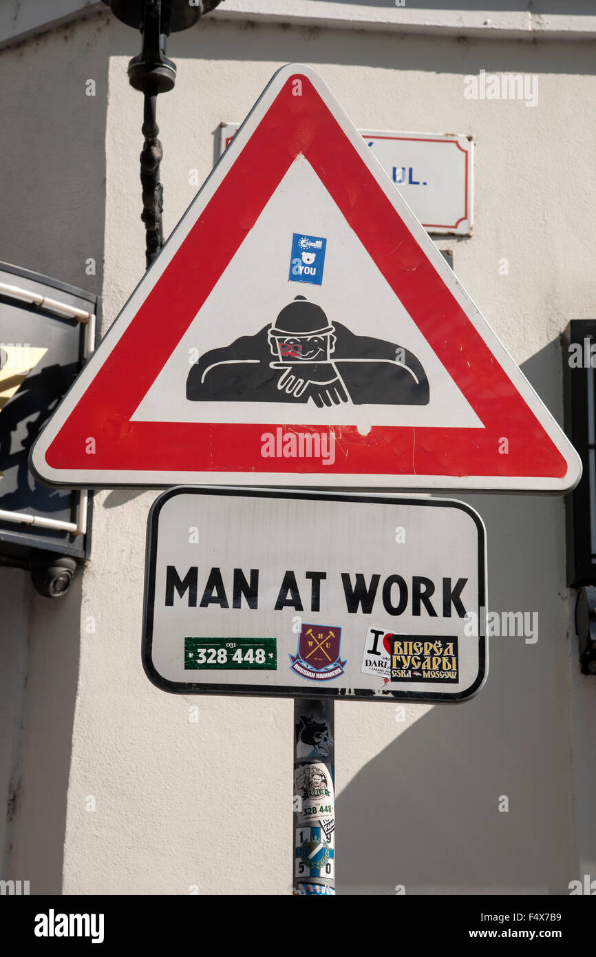 Man at Work Sculpture Sign, Bratislava, Slovakia Stock Photo - Alamy