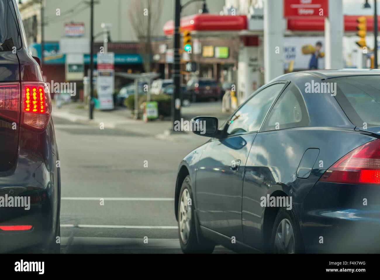 Cars waiting red light in hi-res stock photography and images - Alamy