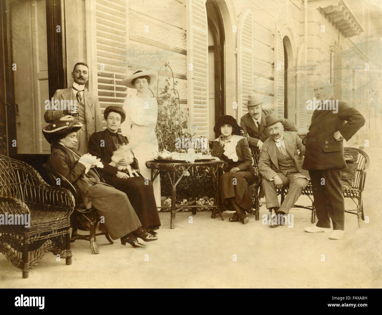 A group smart people in garden villa hi-res stock photography and ...