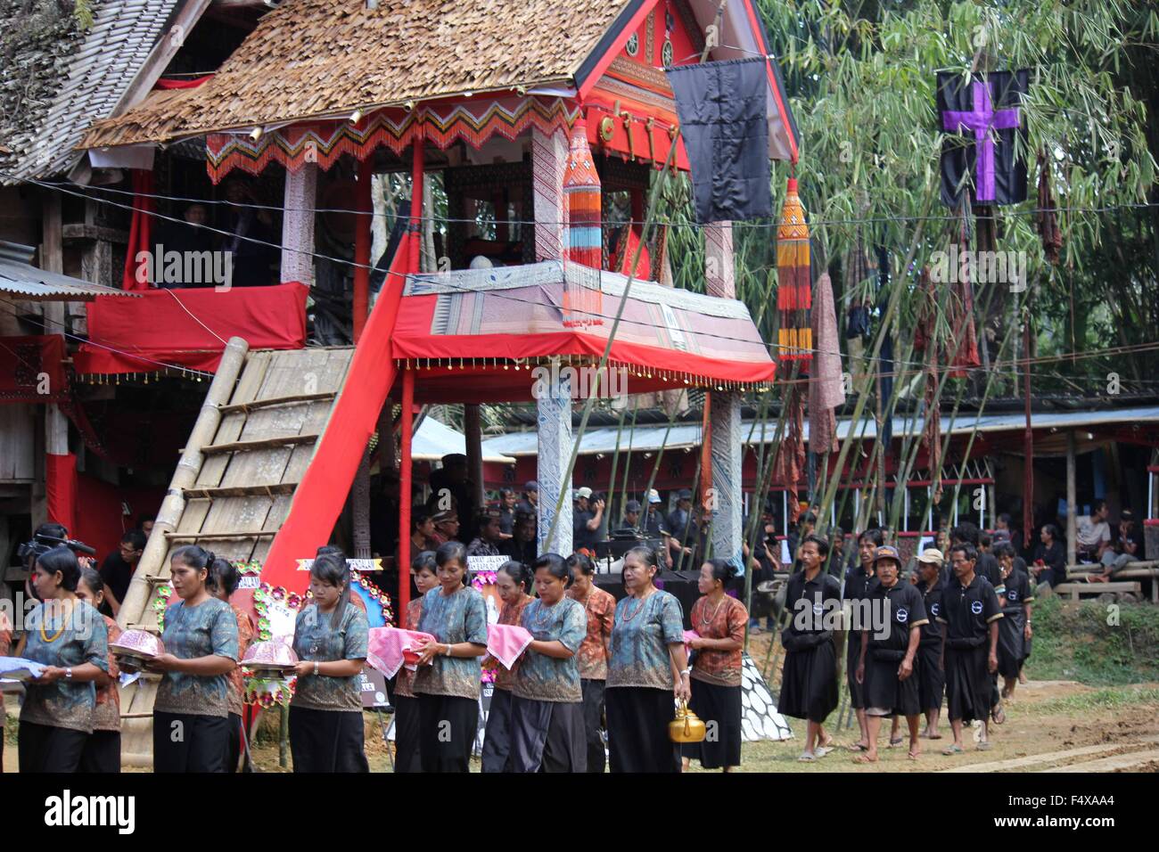 TANA TORAJA, INDONESIA - JULY 4 2012: People procession at a Funeral ...