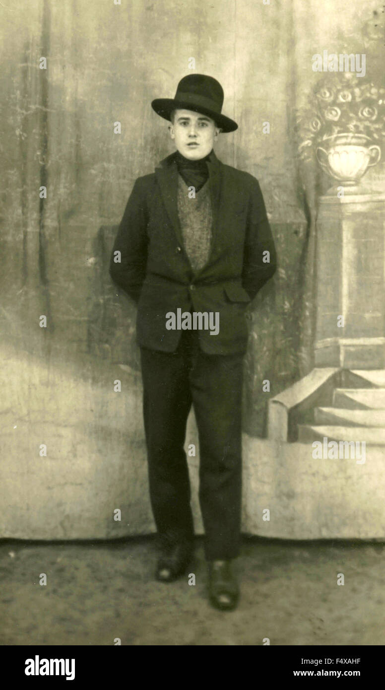 Portrait of a young man with a hat, Italy Stock Photo - Alamy
