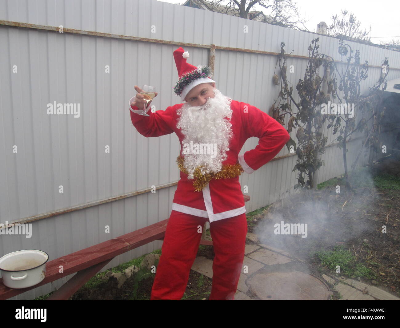 Santa Claus fries a shish kebab. Pastime for New Year's holidays Stock ...