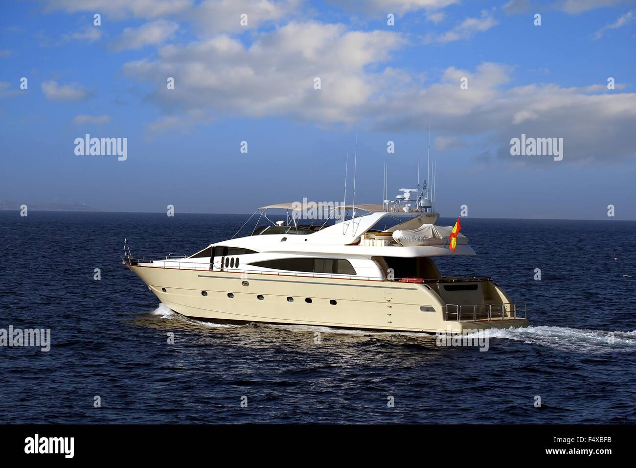 Yacht sailing in open waters Stock Photo - Alamy