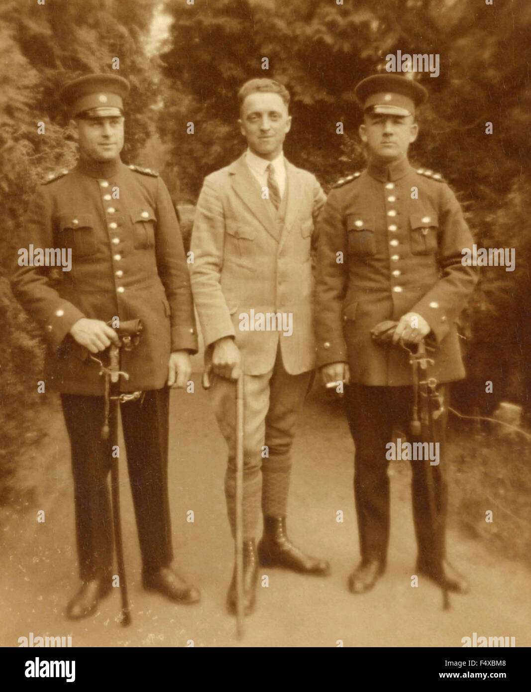 Portrait of two German soldiers and a civilian Stock Photo - Alamy