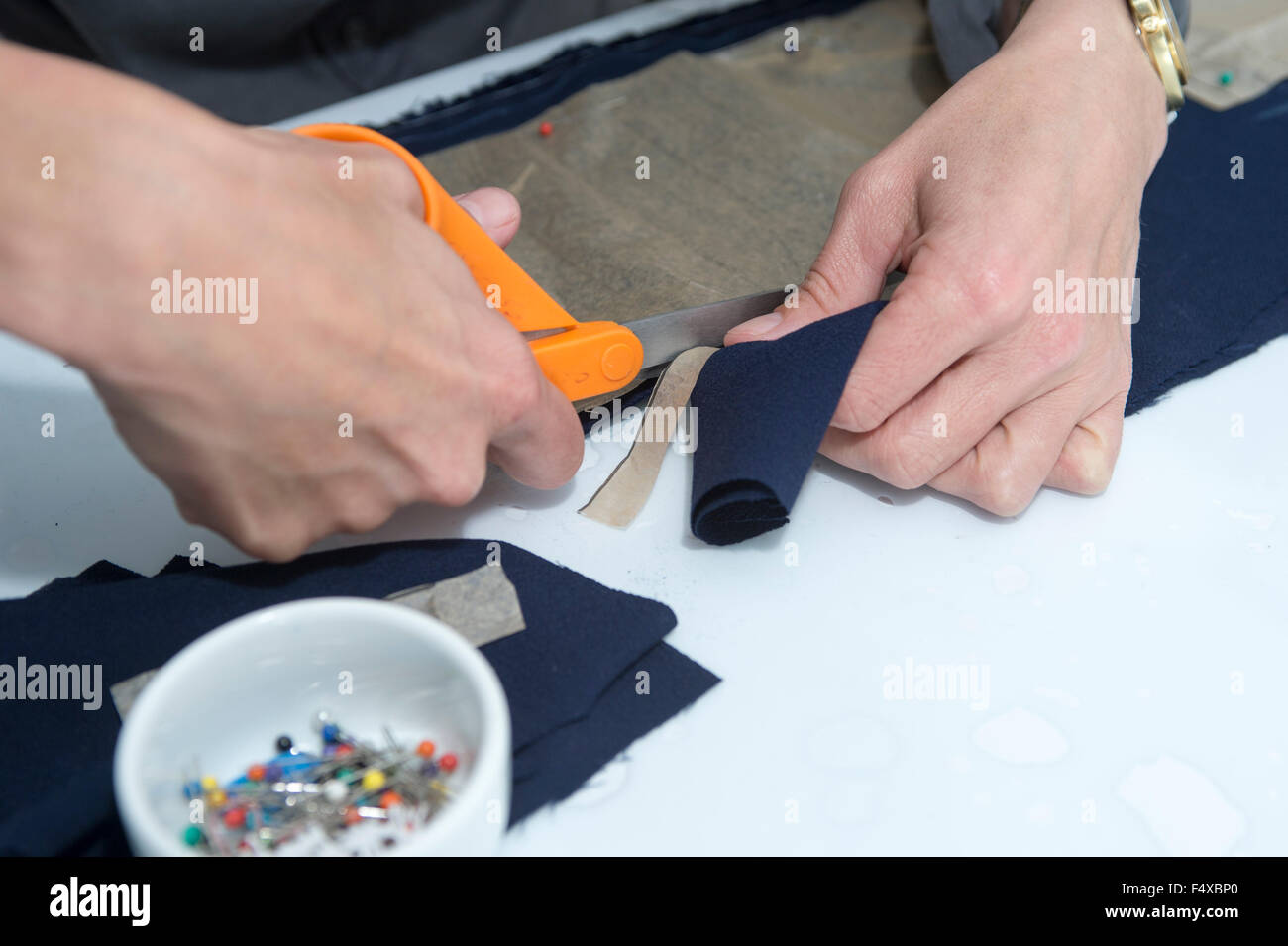 Cutting out cloth hi-res stock photography and images - Alamy