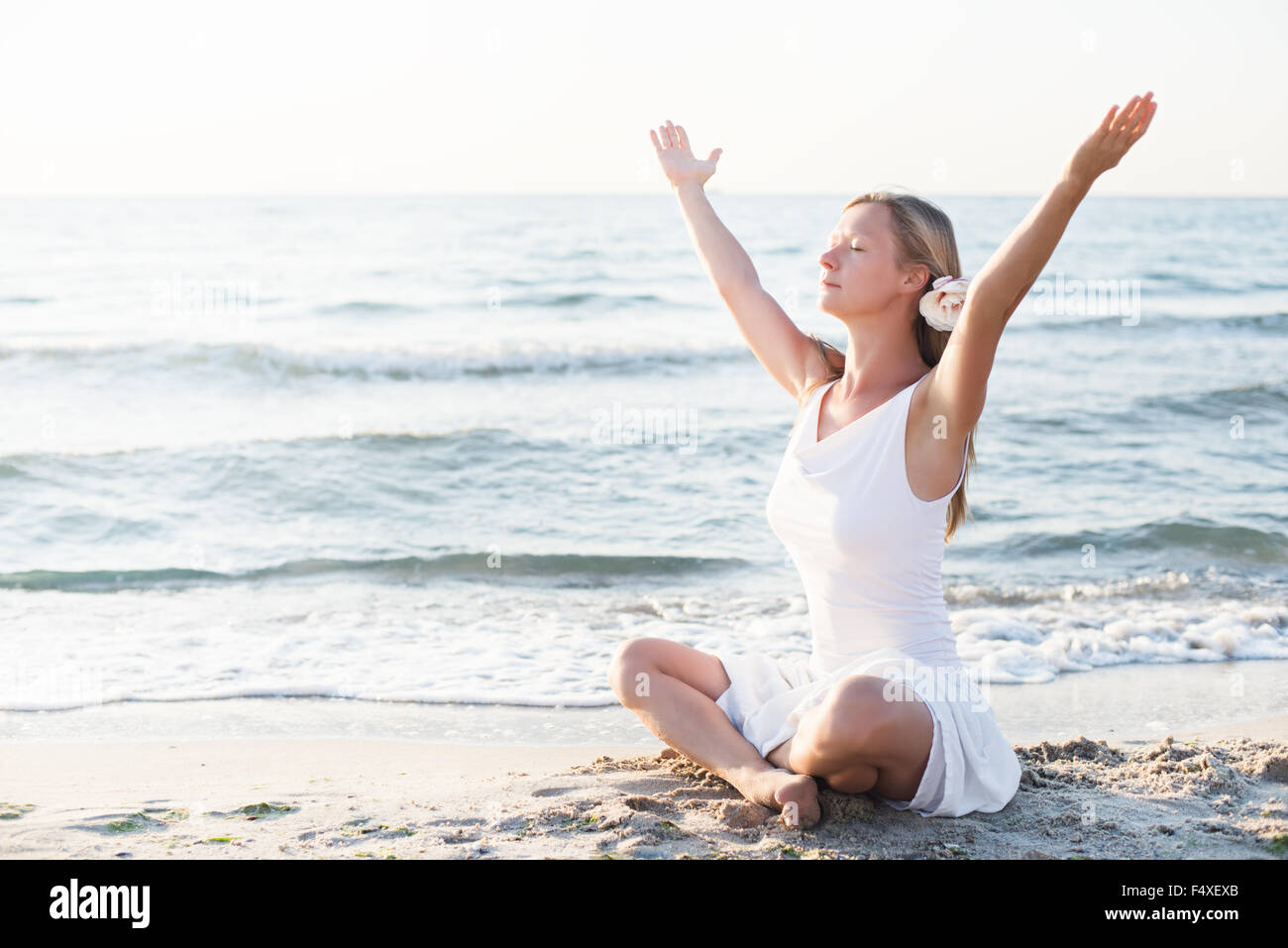 serenity and yoga practicing at sunset, meditation Stock Photo - Alamy