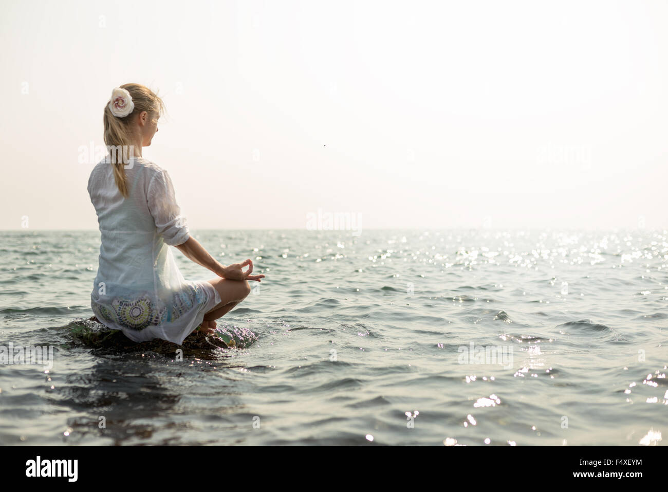 serenity and yoga practicing at sunset, meditation Stock Photo - Alamy