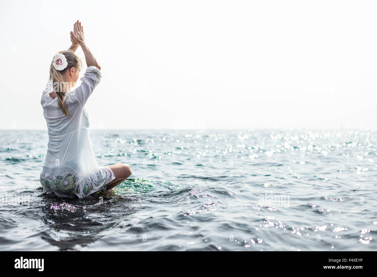 serenity and yoga practicing at sunset, meditation Stock Photo - Alamy