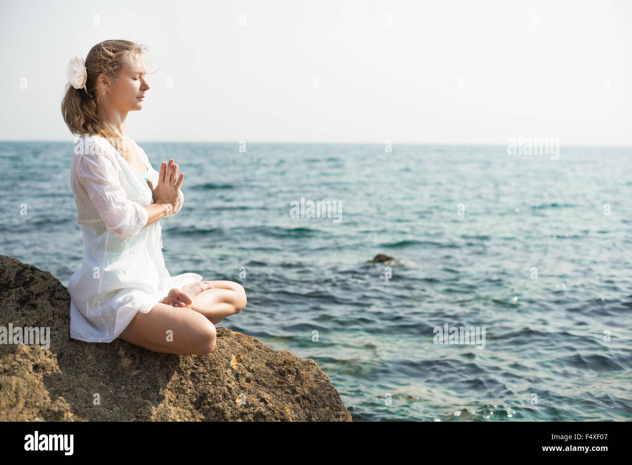 serenity and yoga practicing at sunset, meditation Stock Photo - Alamy