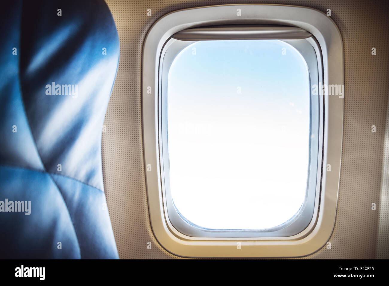 Airplane seat and window inside an aircraft Stock Photo - Alamy