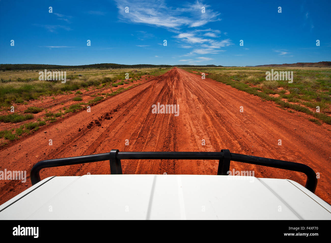 Red desert track in Central Australia Stock Photo - Alamy