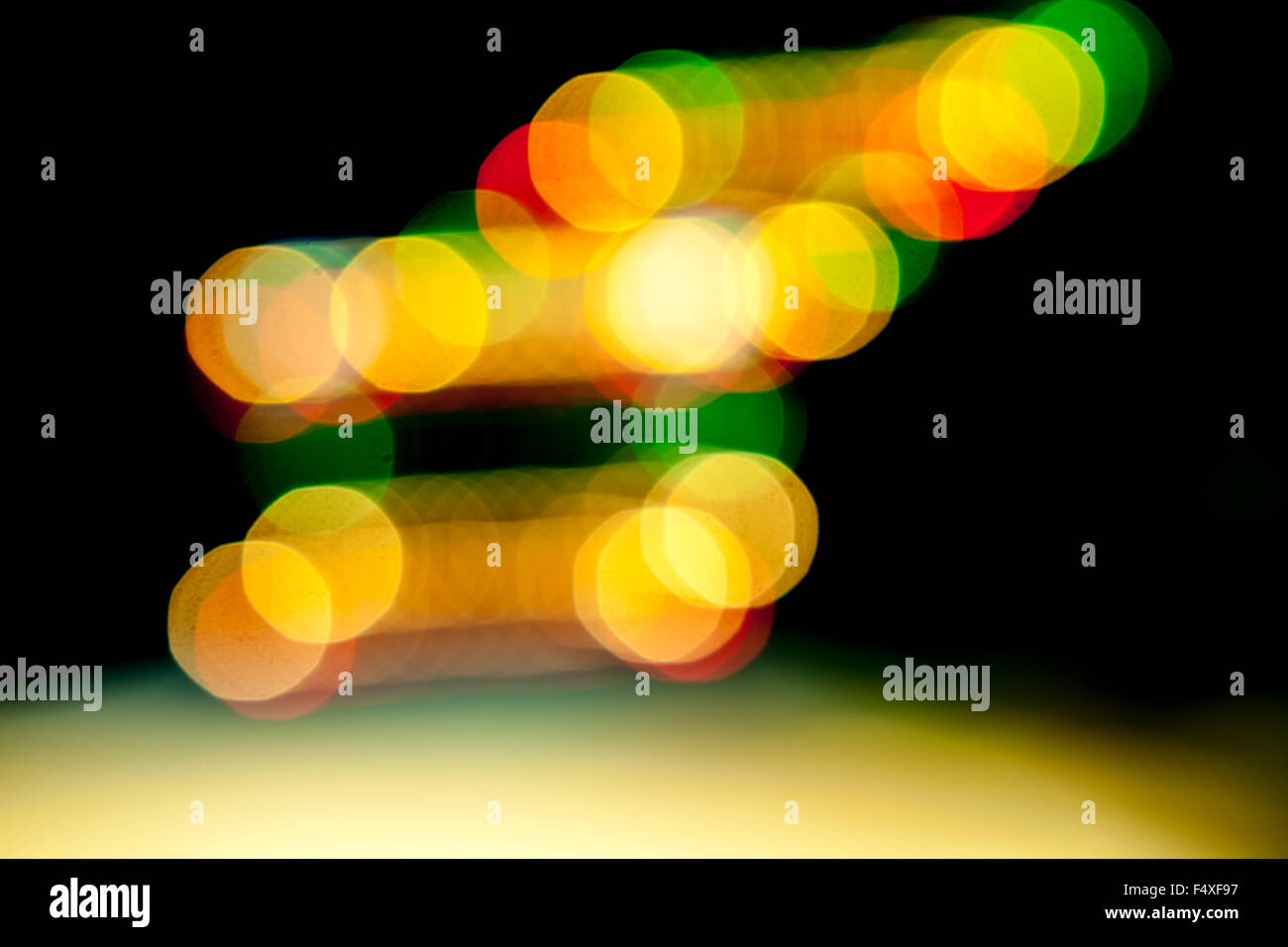 light-colored lines and dots in the dark at night Stock Photo - Alamy