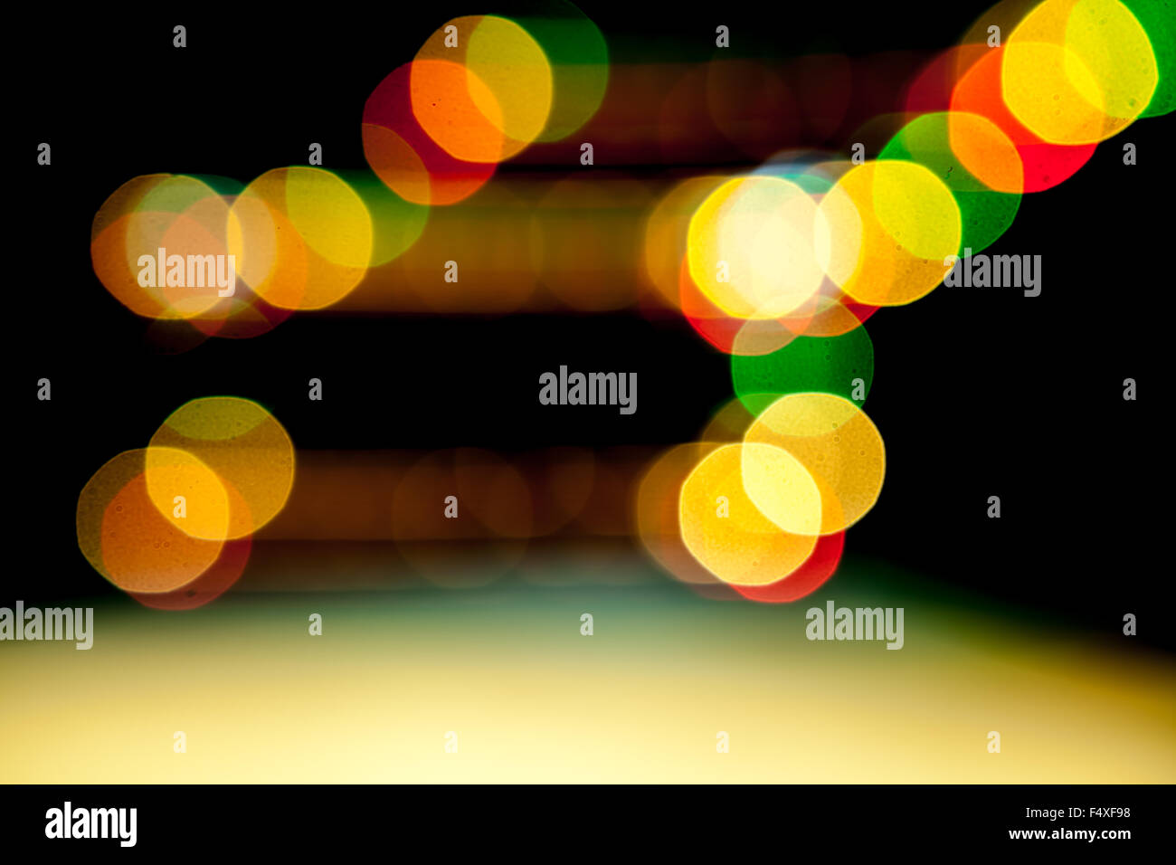 light-colored lines and dots in the dark at night Stock Photo - Alamy