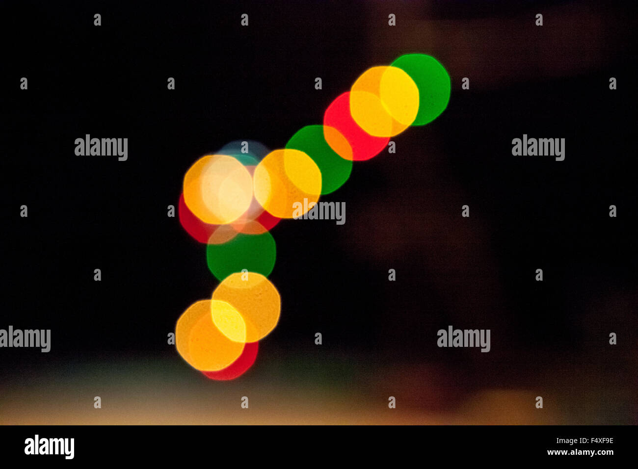 light-colored dots in the dark at night Stock Photo - Alamy