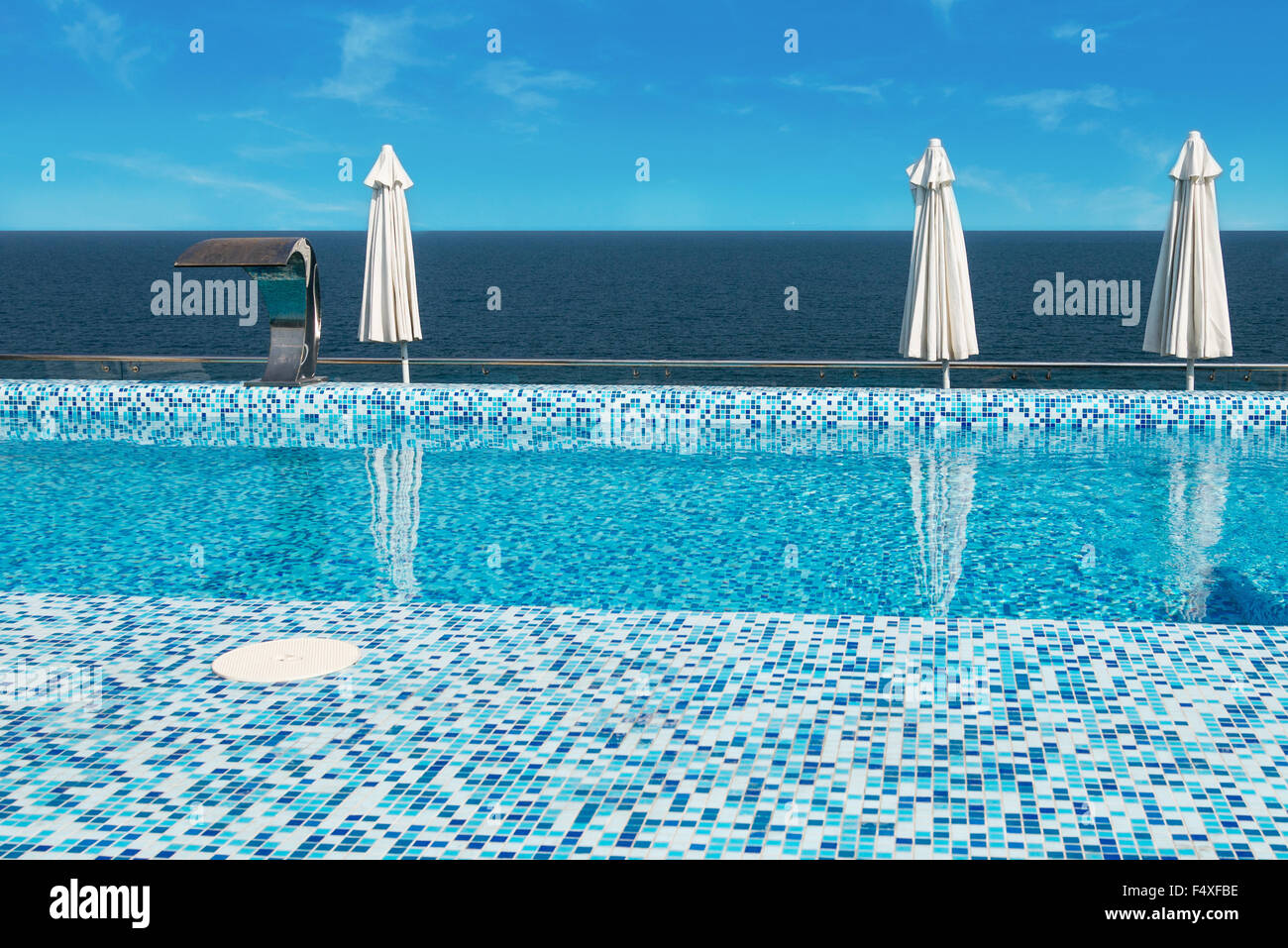 Swimming pool of luxury hotel near the sea Stock Photo - Alamy