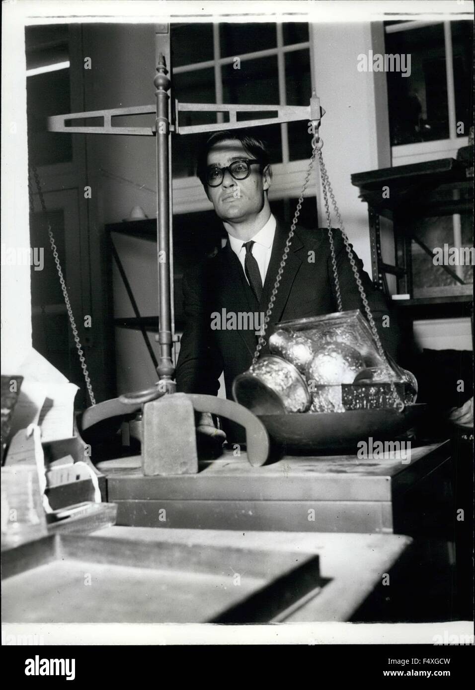 1968 - Weighing: Richard Cane, silver expert, weighs and then values ...