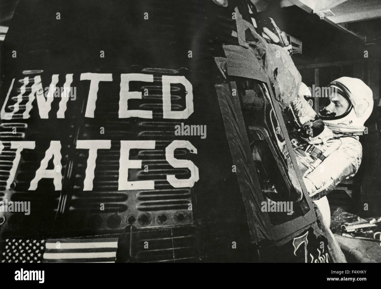 The American astronaut John Glenn enters the space capsule during ...