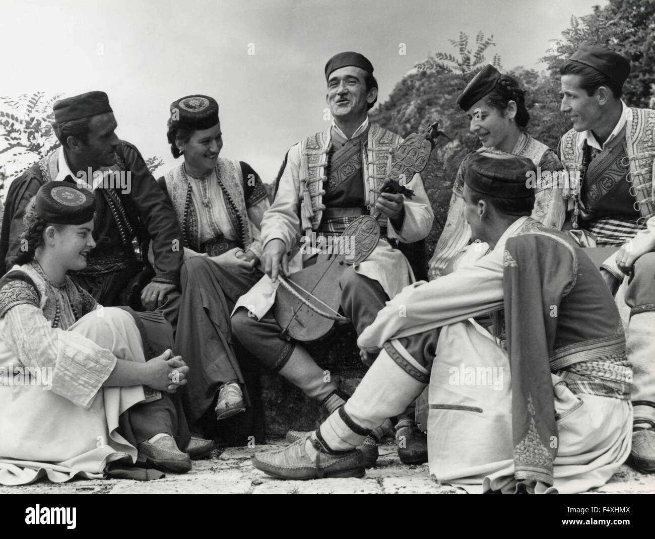 A group wearing traditional costumes of Montenegro Stock Photo - Alamy