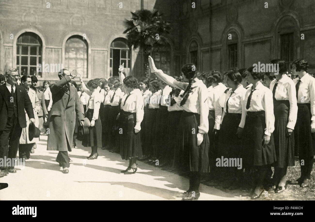 The students of a girls' school salute the school authorities Roman ...