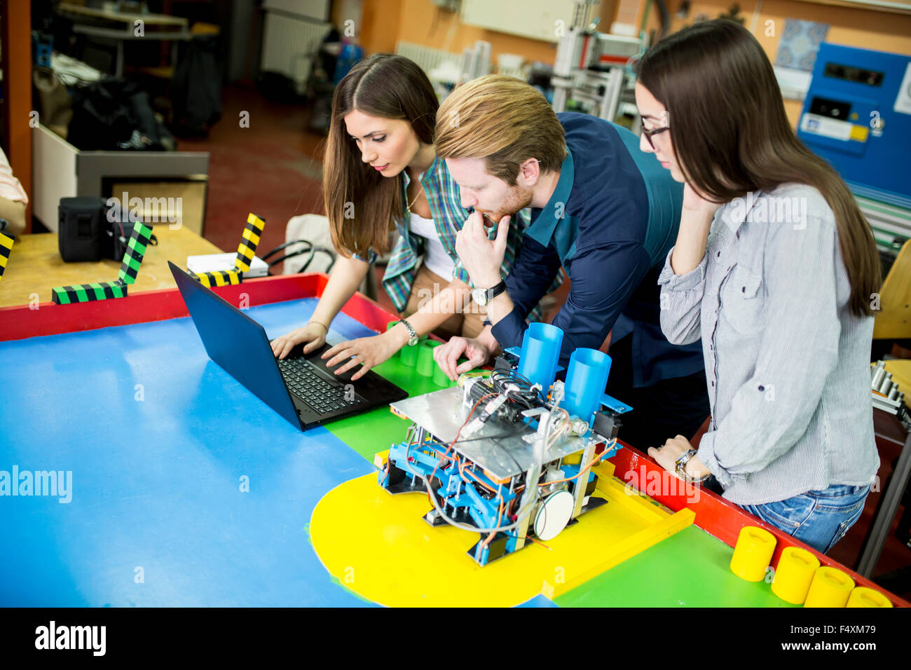 Young people in the robotics classroom Stock Photo - Alamy