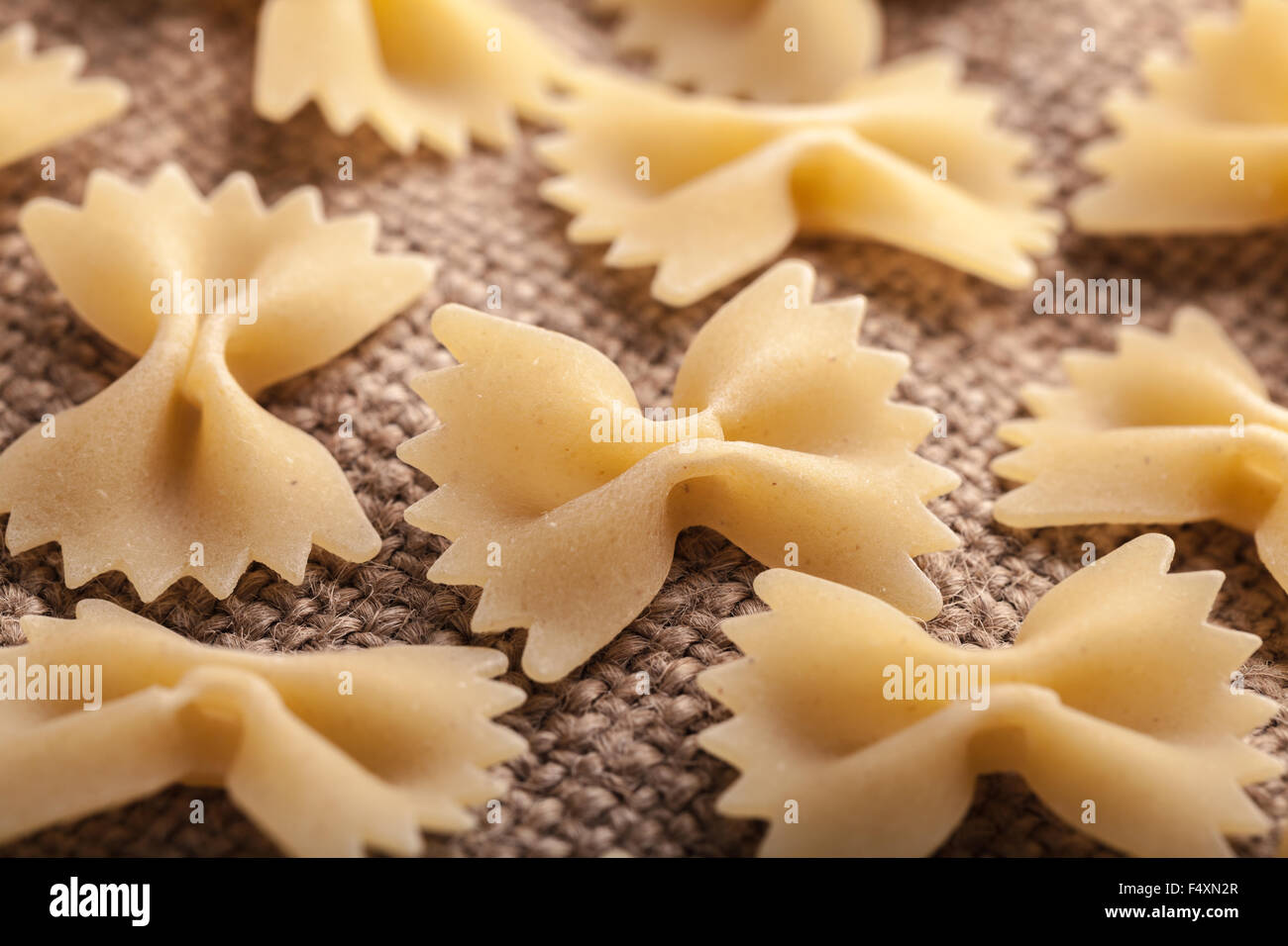 raw the pasta closeup on vintage background Stock Photo - Alamy