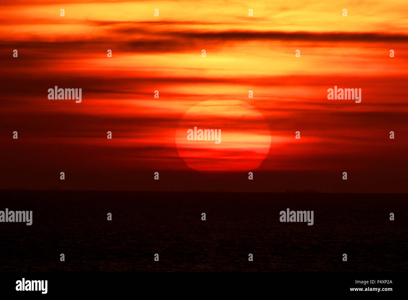 Sunset over The Wash from Hunstanton Stock Photo - Alamy