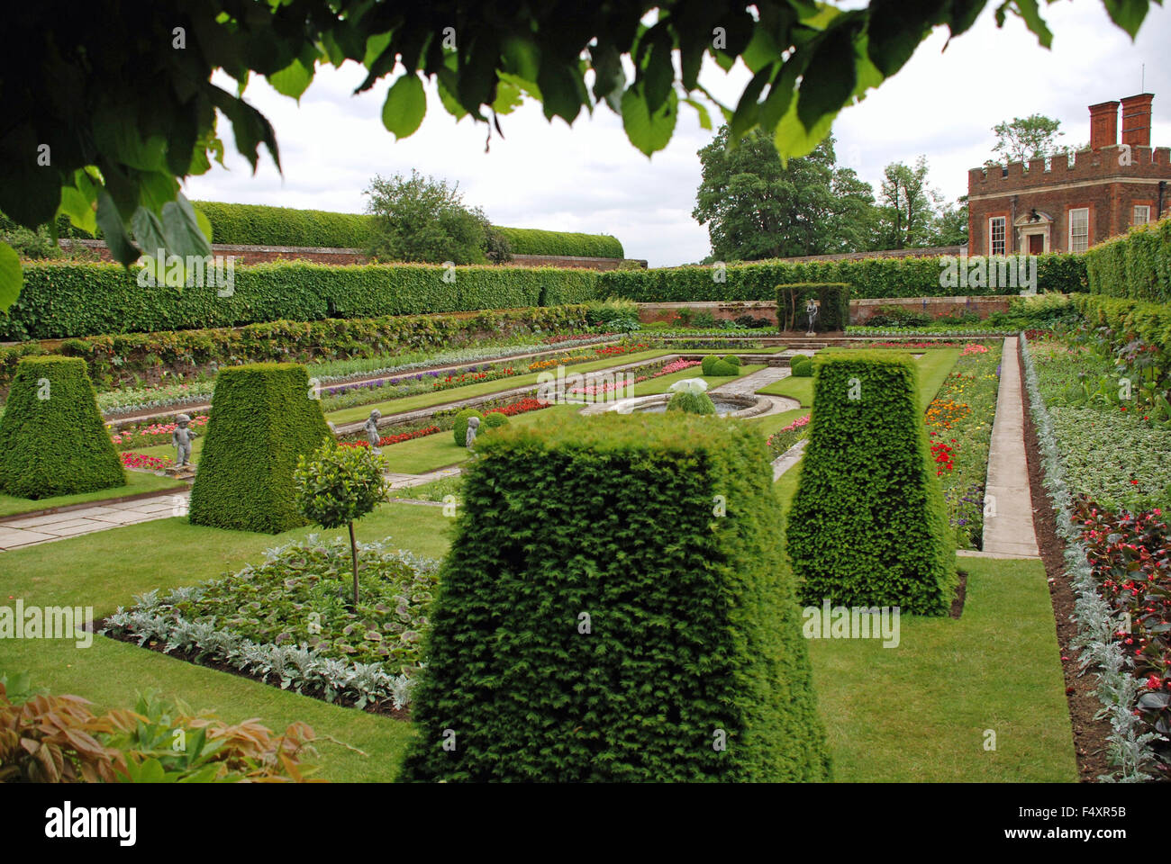 Formal gardens trimmed hedge topiary stone rock path and sculptures at ...