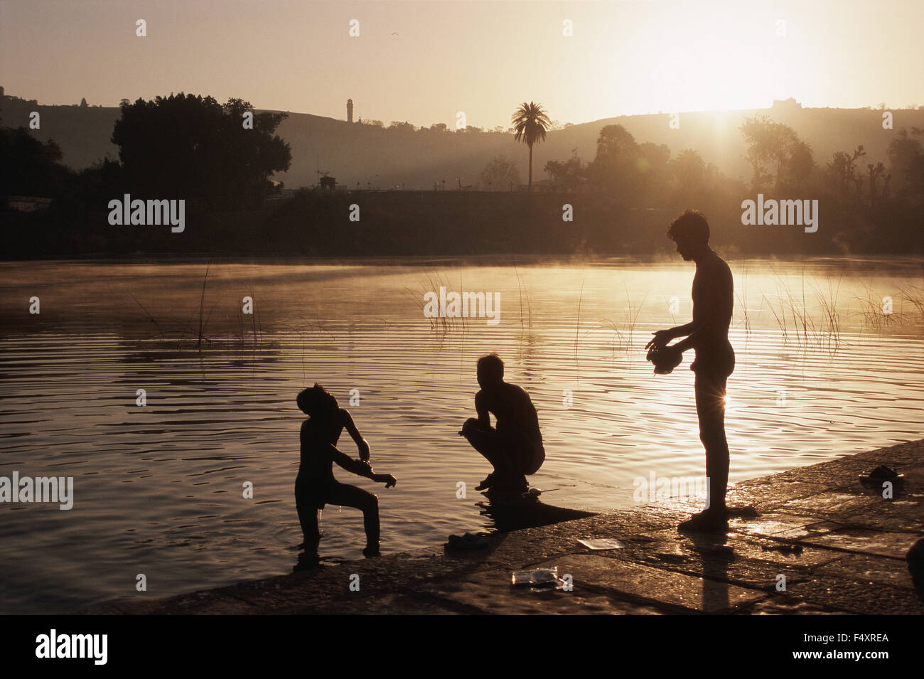 Young men bathing in river hi-res stock photography and images - Alamy