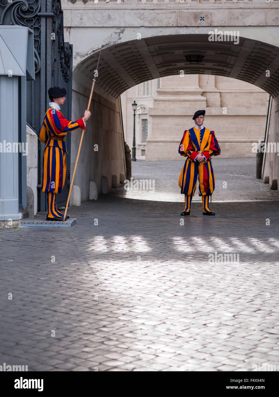 Two members of the Swiss Guard stand sentinel over a side entry to St ...