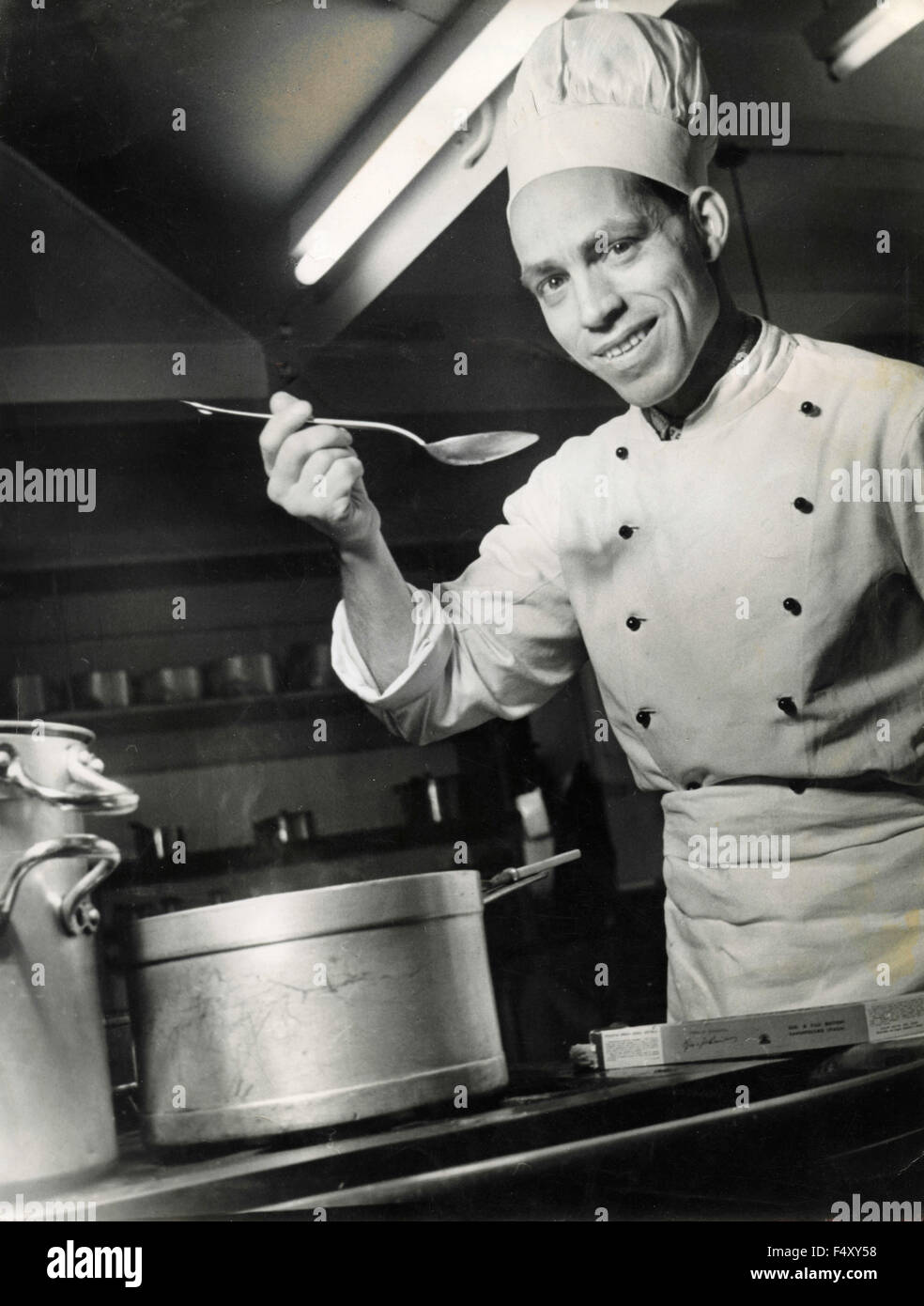 A cook taste his cuisine, Denmark Stock Photo - Alamy