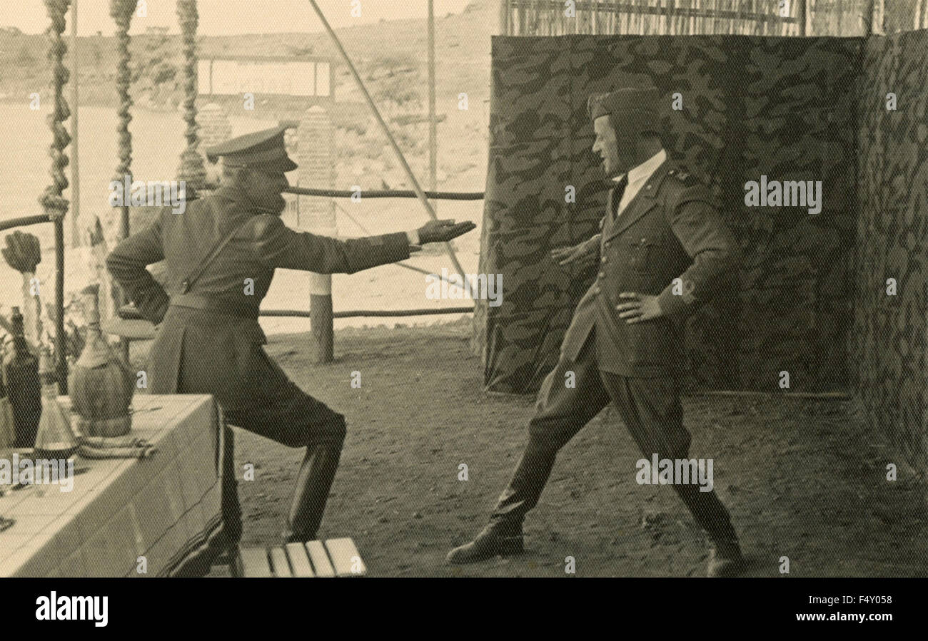 Two figures fencing hi-res stock photography and images - Alamy